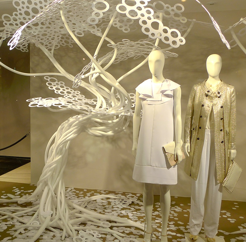 White foam PVC routered to create retail window display.